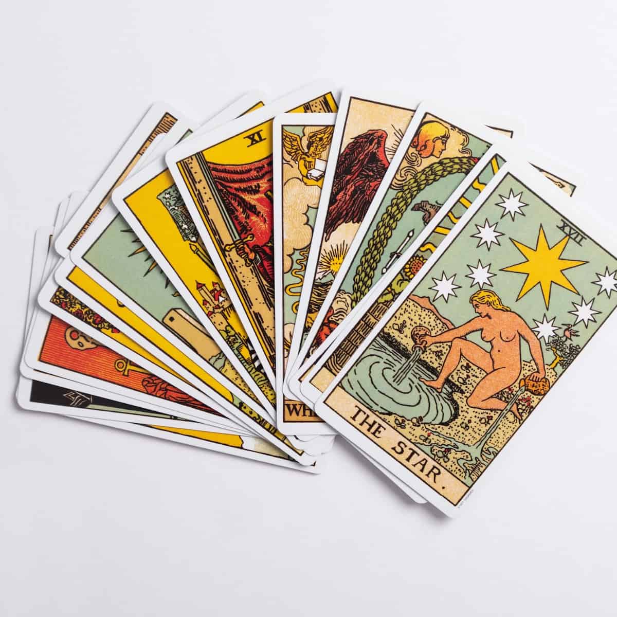 How to Use Tarot for Manifestation (and 12 Powerful Cards!) - Through ...